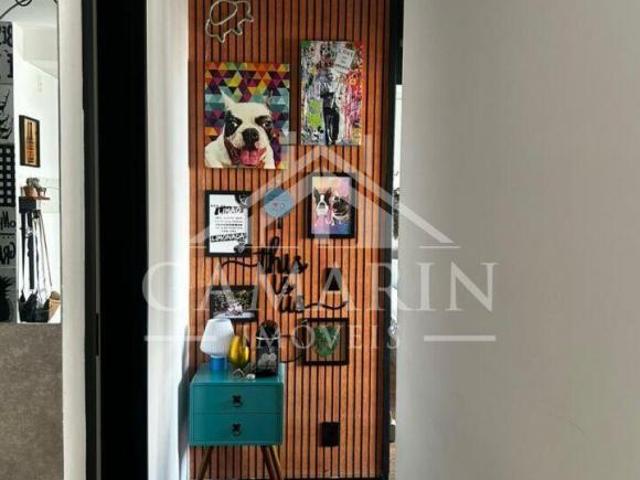 Apartamento de 50m², 2 dormitórios, armários planejados, Sacada fechada em vidro, vaga de garagem
