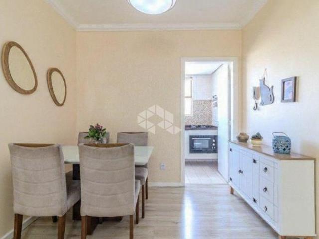 APARTAMENTO DE 65m² COM 2 DOM/QUARTOS COM SACADA E VAGA NO MENINO DEUS