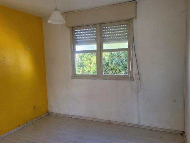 Apartamento de 01 dormitório com vaga no bairro camaquã em Porto Al