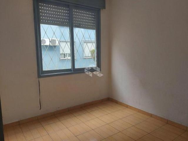 APARTAMENTO DE 01 DORMITORIO COM VAGA DE GARAGEM ROTATIVA NO BAIRRO CAVALHADA