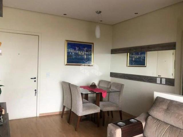 Apartamento de 02 dormitórios, com churrasqueira, 01 vaga de garagem escriturada, com linda vista, s
