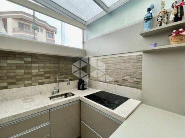 Apartamento de 02 dormitórios com suíte no bairro Pio X em Caxias do Sul