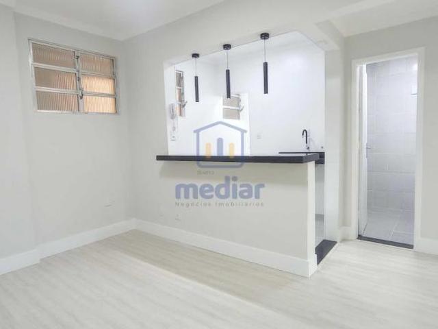 Apartamento de 02 dormitórios com vista lateral para o mar a venda em Santos Embaré