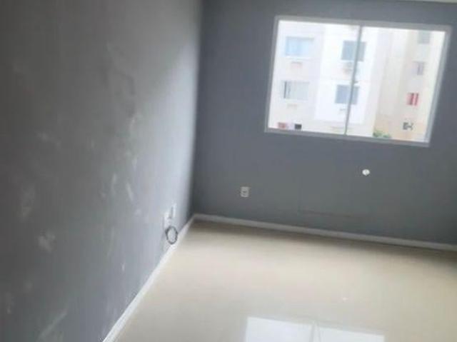Apartamento de 02 dormitórios, sala, cozinha planejada, 01 vaga. Bairro Mato grande