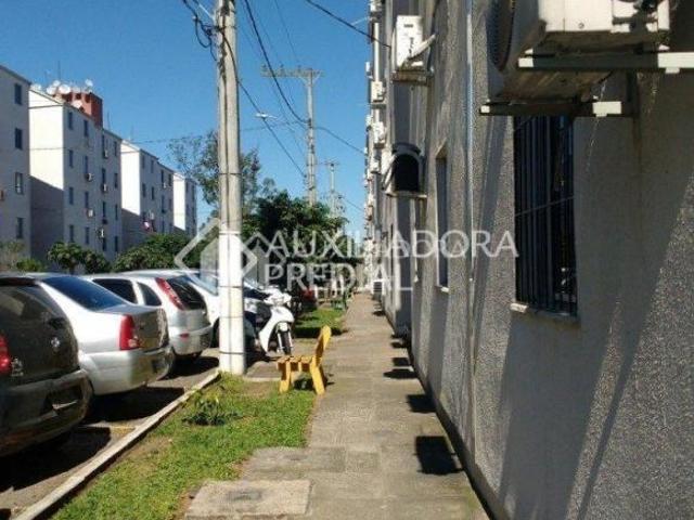 Apartamento de 02 dormitórios, sala de estar/jantar integrada com cozinha americana