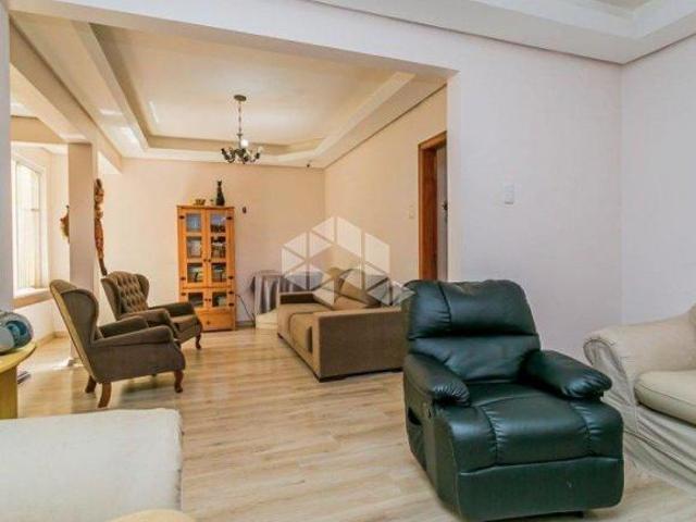 Apartamento de 113m2, living em 3 ambientes cercado por jardim de inverno