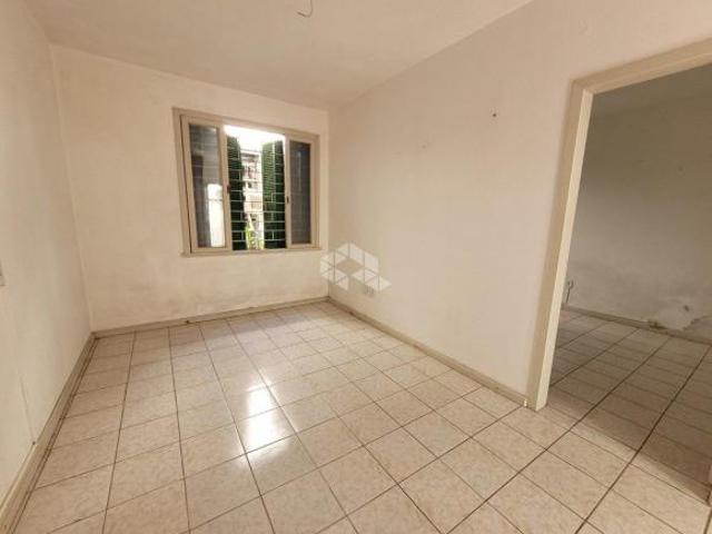 Apartamento de 1 dormitório com pátio próximo a praça da Encol