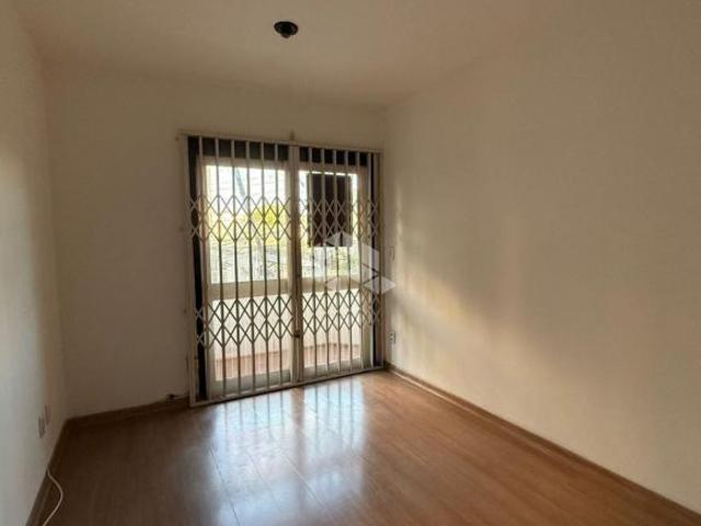 Apartamento de 1 dormitório com sacada, churrasqueira e vaga de garagem escriturada no Jardim Botâni