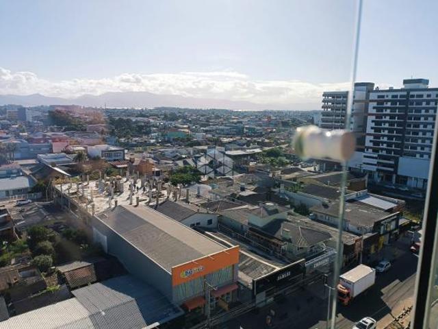Apartamento de 1 dormitório, com vaga box, praia de Capão da Canoa na Av. Ubirajara