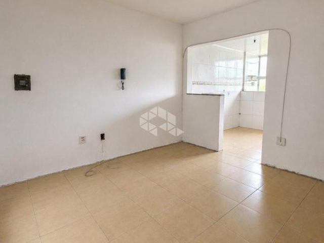 Apartamento de 1 dormitório com 1 vaga de garagem, no bairroo Humaitá, em Porto