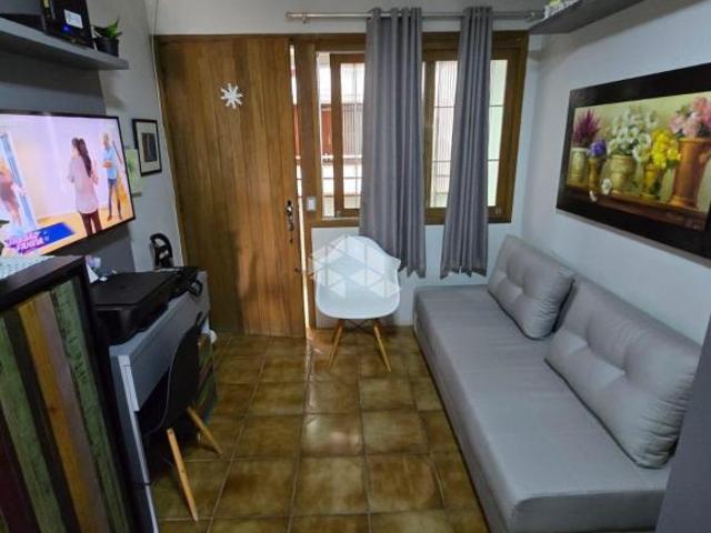 Apartamento de 1 dormitório de frente com sacada vista para serra, no Centro de Capão da Canoa