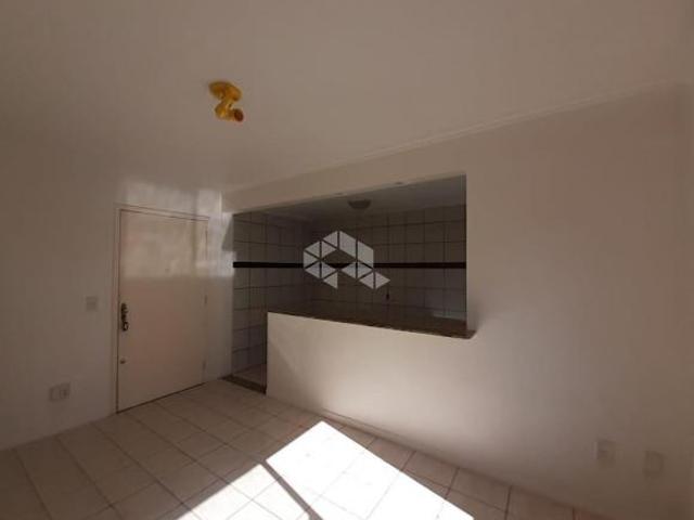 Apartamento de 1 dormitório e 1 vaga de garagem coberta e escriturada no bairro Cristal
