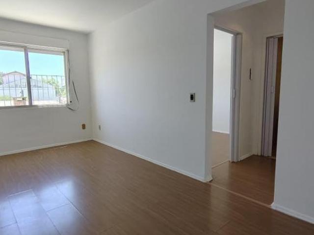 Apartamento de 1 dormitório e 1 vaga escriturada no bairro Camaquã