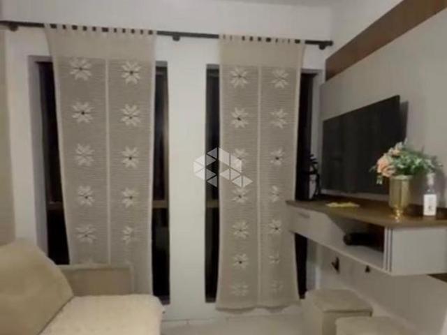 Apartamento de 1 dormitório mobiliado com box/vaga de garagem em Capão da Canoa