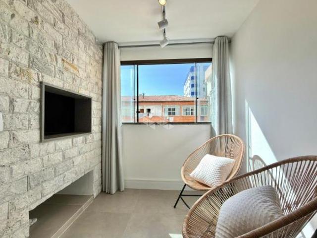 Apartamento de 1 dormitório mobiliado com box/vaga de garagem na Zona Nova de Ca