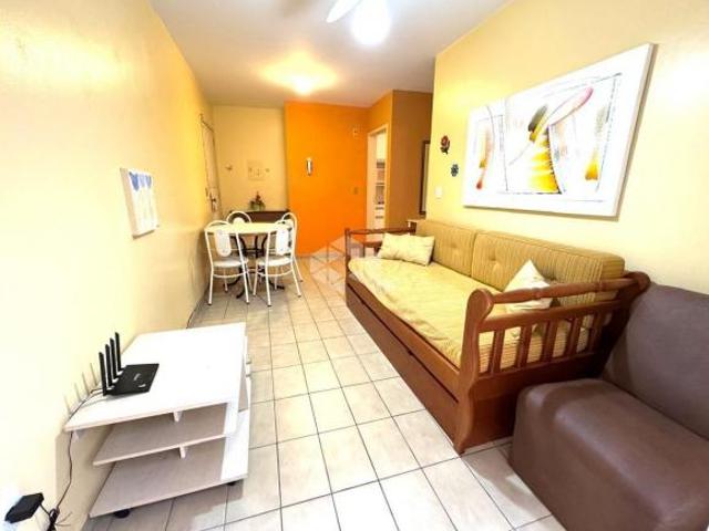 Apartamento de 1 dormitório, mobiliado e com box para carro, à venda no Centro d