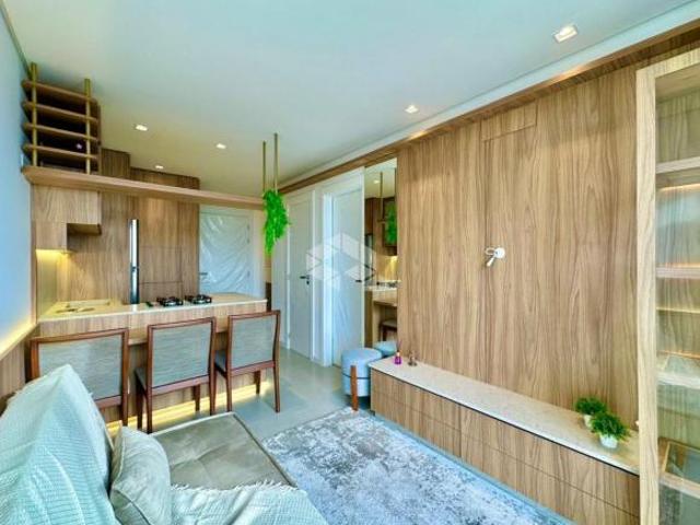 Apartamento de 1 dormitório, mobiliado e decorado, com 46,44m², churrasqueira