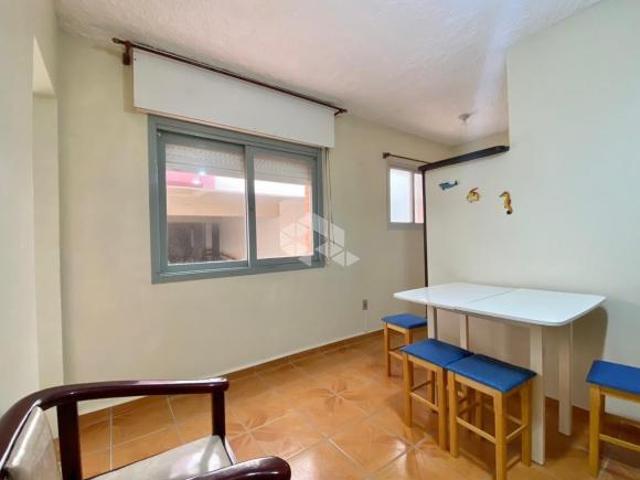 Apartamento de 1 dormitórios mobiliado com vaga de garagem em Capão da Canoa