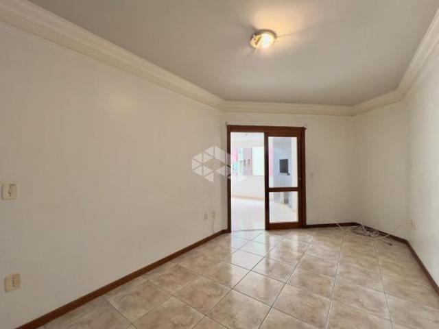 Apartamento de 1 dormitórios com sacada e box/vaga de garagem no Centro de Capão da Canoa