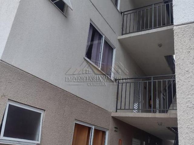 Apartamento de 2º andar com 2 dormitórios, vaga de