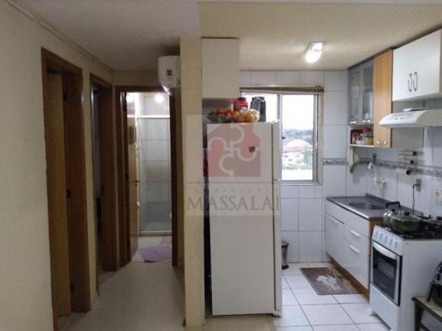 Apartamento de 2 dormitórios com estacionamento no Bairro Vila Nova em Porto alegre