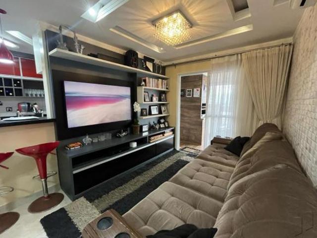 Apartamento de 2 dormitório com sacada gourmet em Praia Grande SP