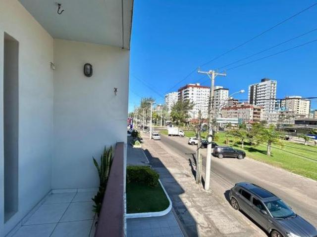 Apartamento de 2 dormitórios mobiliado com sacada de frente e vaga de garagem na Zona Nova de Capão