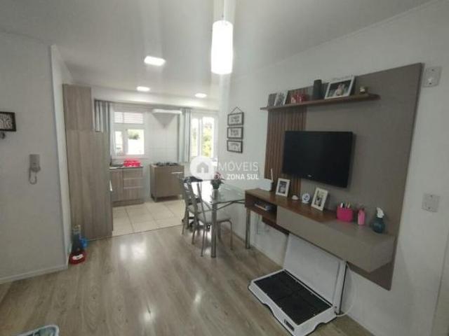 Apartamento de 2 dormitórios na Restinga Semimobiliado