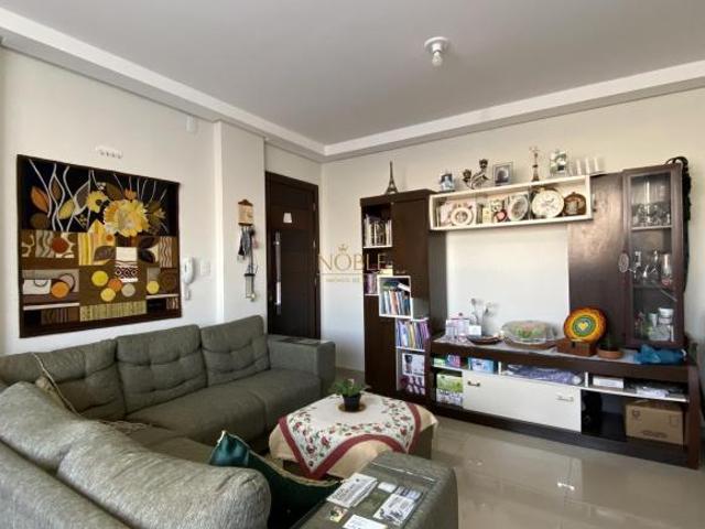 Apartamento de 2 dormitórios no centro de Torres