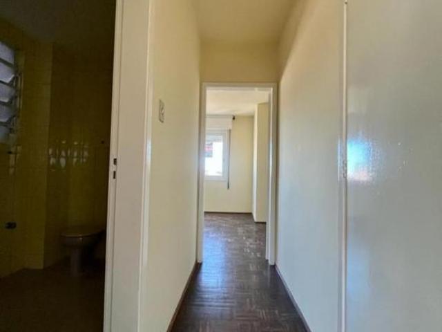 Apartamento de 2 dormitórios à venda no Edifício América, em excelente localização na região central