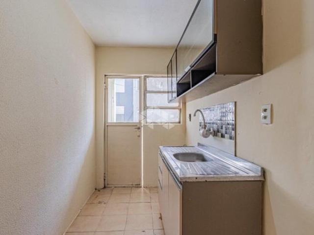 Apartamento de 2 dormitórios.Andar alto. Condomínio Elevador. Zona Norte