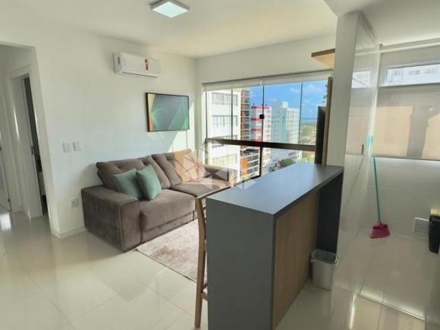 Apartamento de 2 dormitórios com 1 suíte e box estacionamento no bairro Navegantes em Capão da Canoa