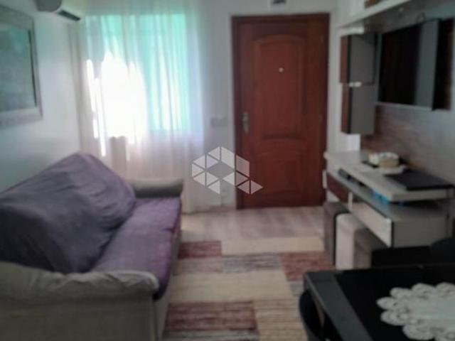 Apartamento de 2 dormitorios com 1 vaga de garagem, no Bairro Humaitá, em Porto Alegre