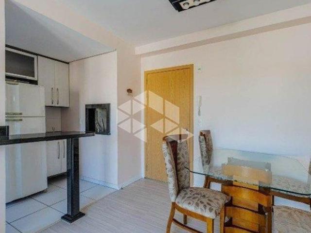 Apartamento de 2 dormitórios com 1 vaga no Bairro Partenon