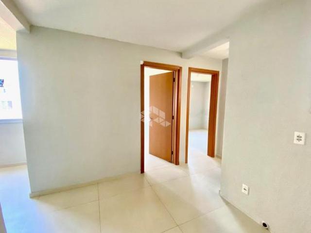 Apartamento de 2 dormitórios com 1 vaga privativa no bairro Olaria em Canoas
