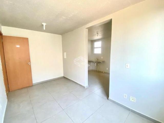 Apartamento de 2 dormitórios com 1 vaga privativa no bairro Olaria em Canoas