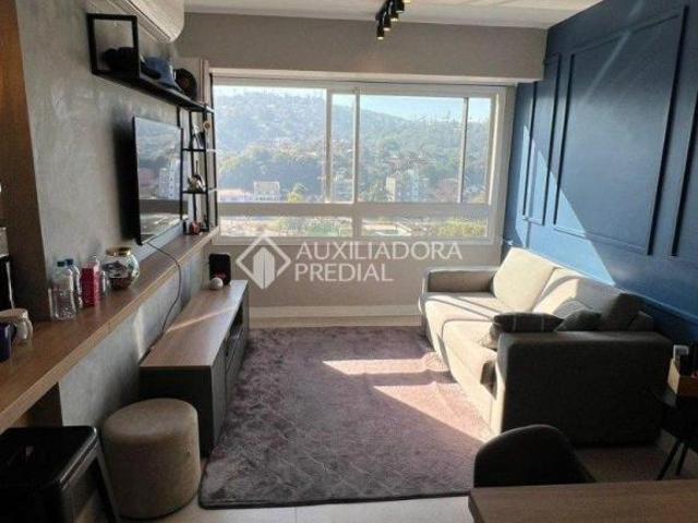 APARTAMENTO DE 2 DORMITÓRIOS COM 2 VAGAS COBERTAS EM PORTO ALEGRE