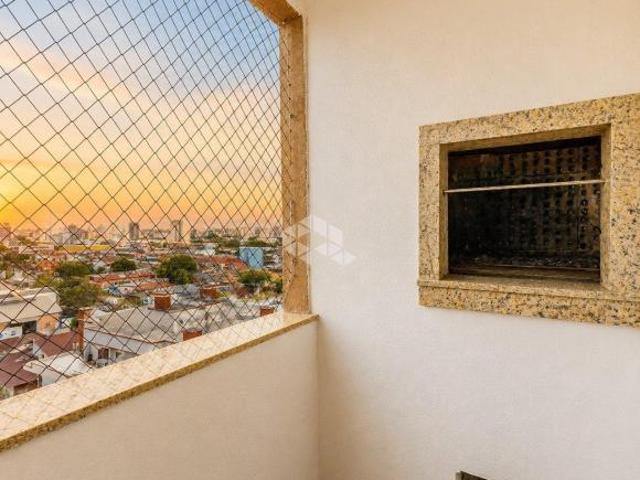 Apartamento de 2 dormitórios com vaga coberta e churrasqueira no Bairro Marechal