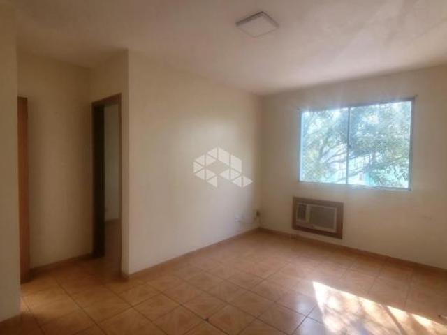 Apartamento de 2 dormitórios com vaga de garagem