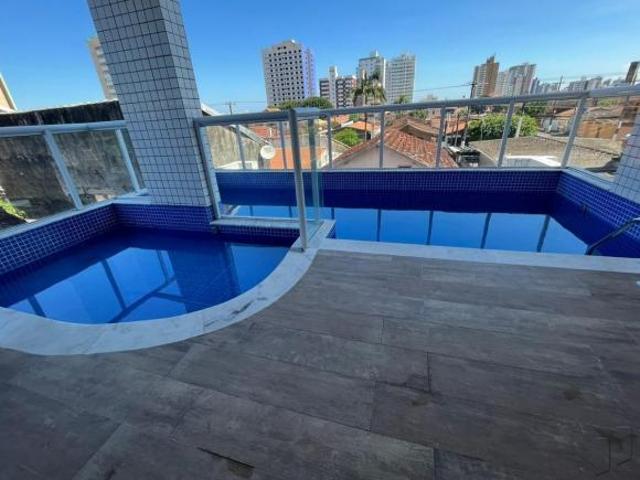 Apartamento de 2 dormitórios com vista lateral para o mar em Praia Grande SP