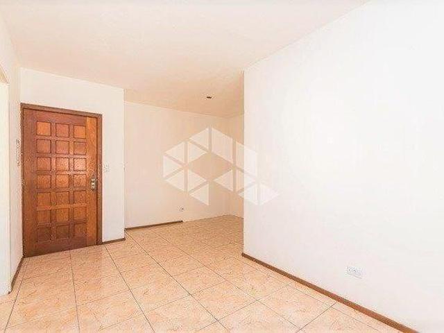 Apartamento de 2 dormitórios com box coberto no Bairro Vila Nova próximo á Cassol e o Big Zona Sul