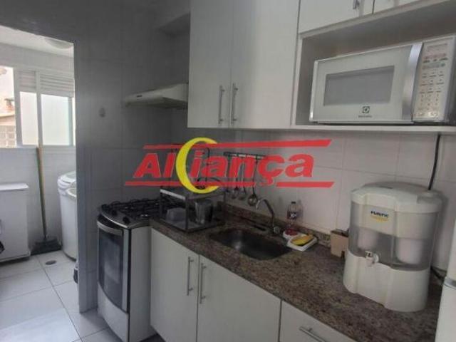 Apartamento de 2 dormitorios com elevador 60M² com Suíte Vaga Porteira Fechada