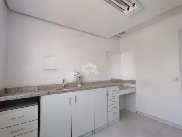 Apartamento de 2 Dormitórios, com pátio privativo, no bairro São João, em Porto Alegre