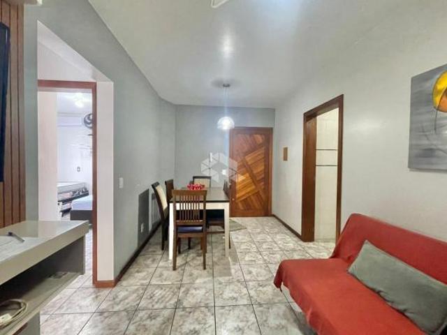 Apartamento de 2 dormitórios com sacada e churrasqueira na Zoan Nova de Capão da Canoa!