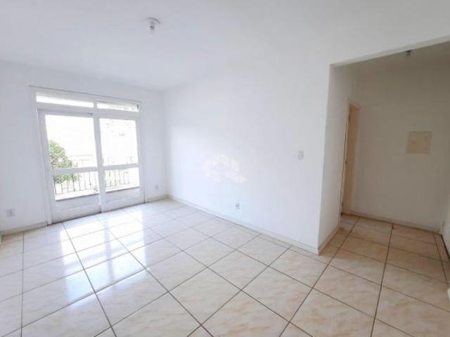 Apartamento de 2 dormitórios com sacada no bairro São João em Porto Alegre