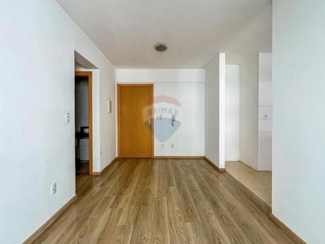 Apartamento de 2 dormitórios com suíte e box fixo de garagem