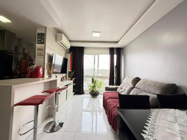 Apartamento de 2 dormitórios com suíte e 2 vagas de garagem no bairro Passo da Areia