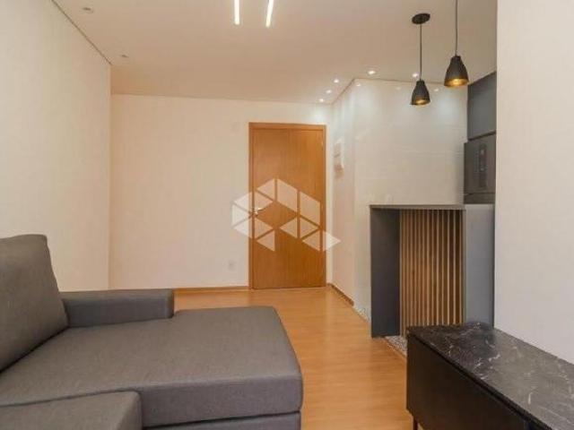 Apartamento de 2 dormitórios com suíte pronto para morar!