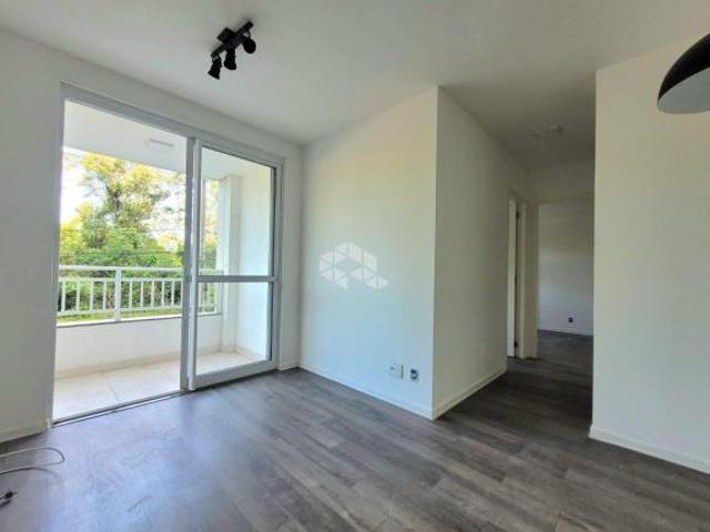 Apartamento de 2 dormitórios com suíte, sacada e 1vaga de garagem no Humaitá