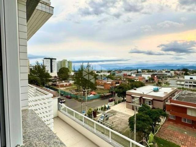 Apartamento de 2 dormitórios e 1 vaga à venda em Capão da Canoa